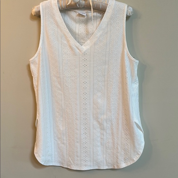 Xieerduo | Tops | Ivory Ribbed Tank Top With Sleeveless Design | Poshmark